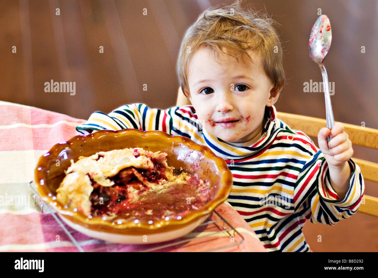 Toddler Eating Cherry Pie Stock Photo - Alamy