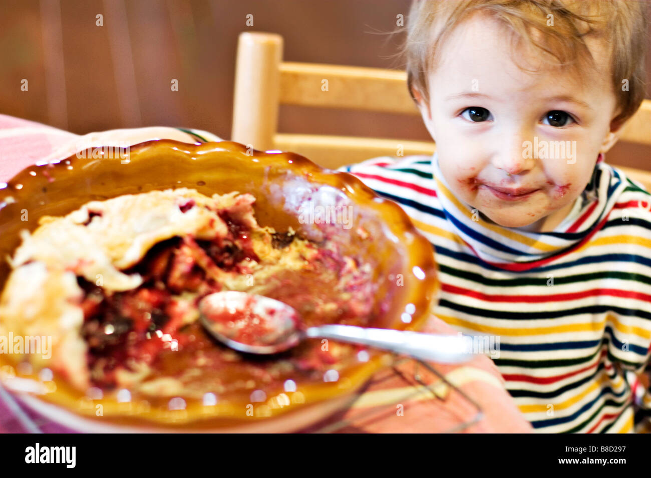 Toddler Eating Cherry Pie Stock Photo - Alamy