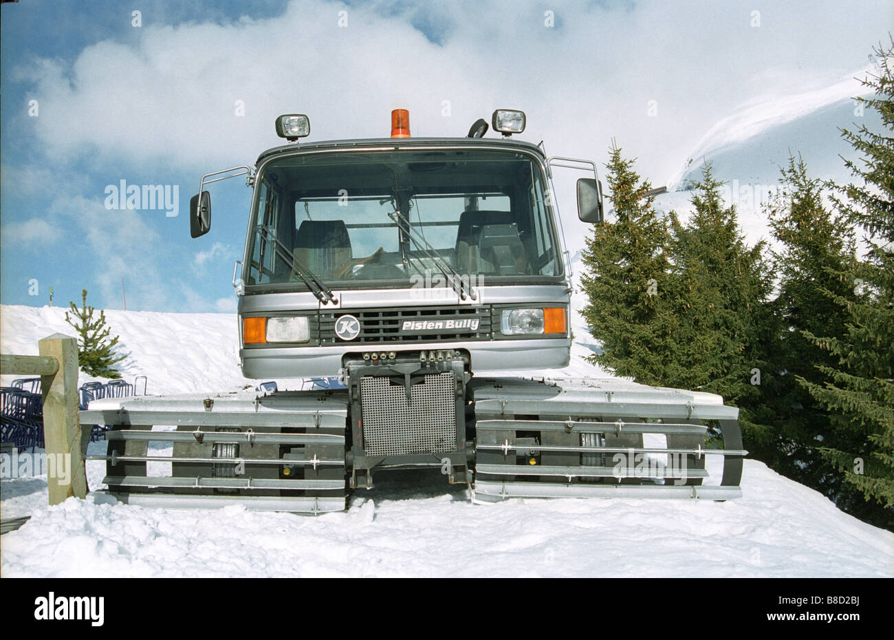 A piste basher in the ski resort of La Clusaz in the Haute Savoir ...