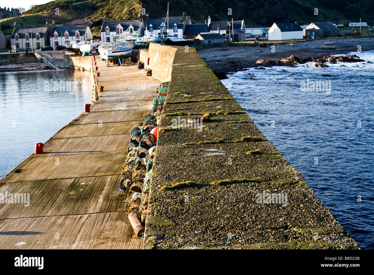 Pier leading to a small village in Findochty, Scotland Stock Photo - Alamy