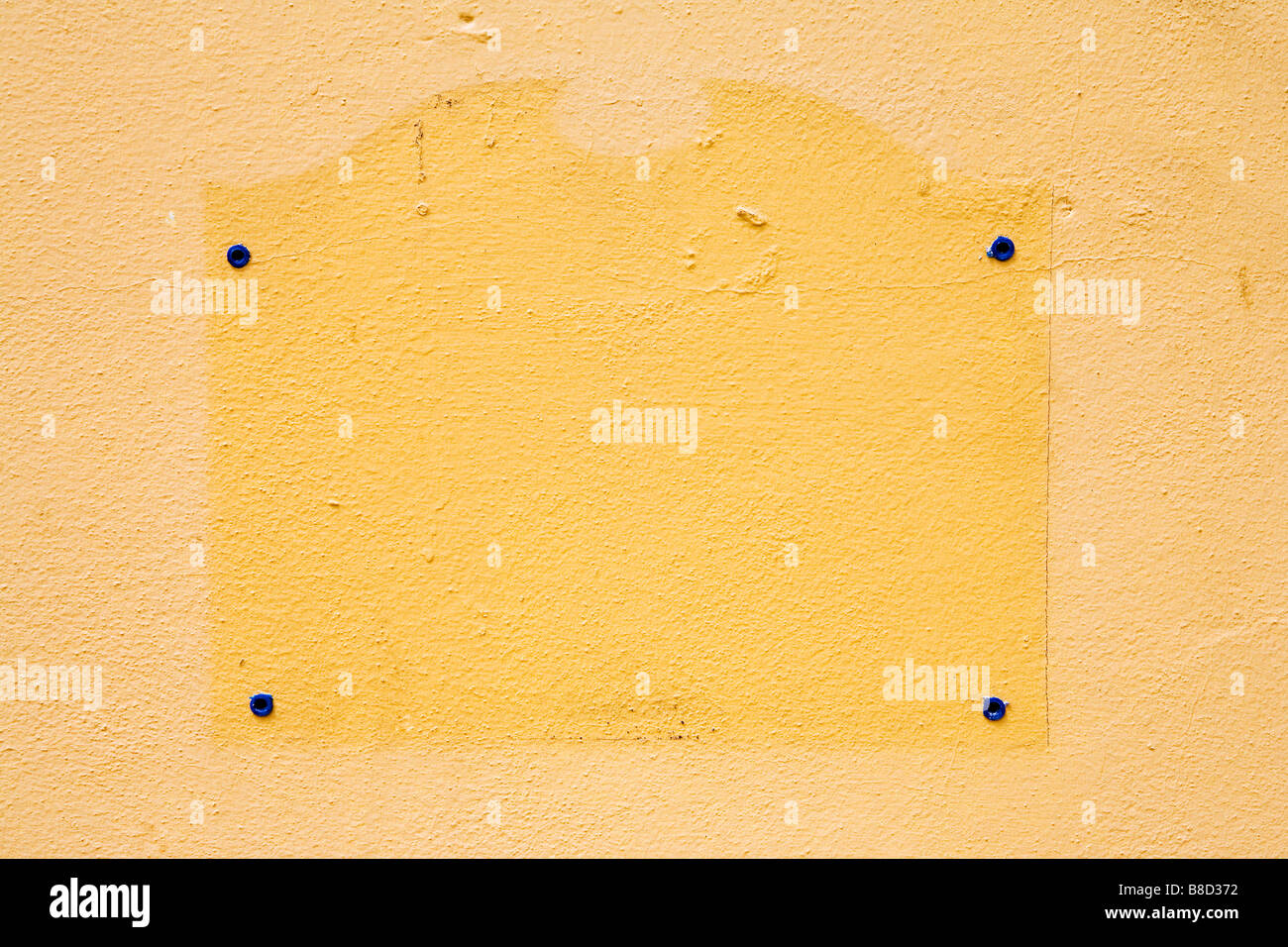A wall with outline of a sign Stock Photo - Alamy
