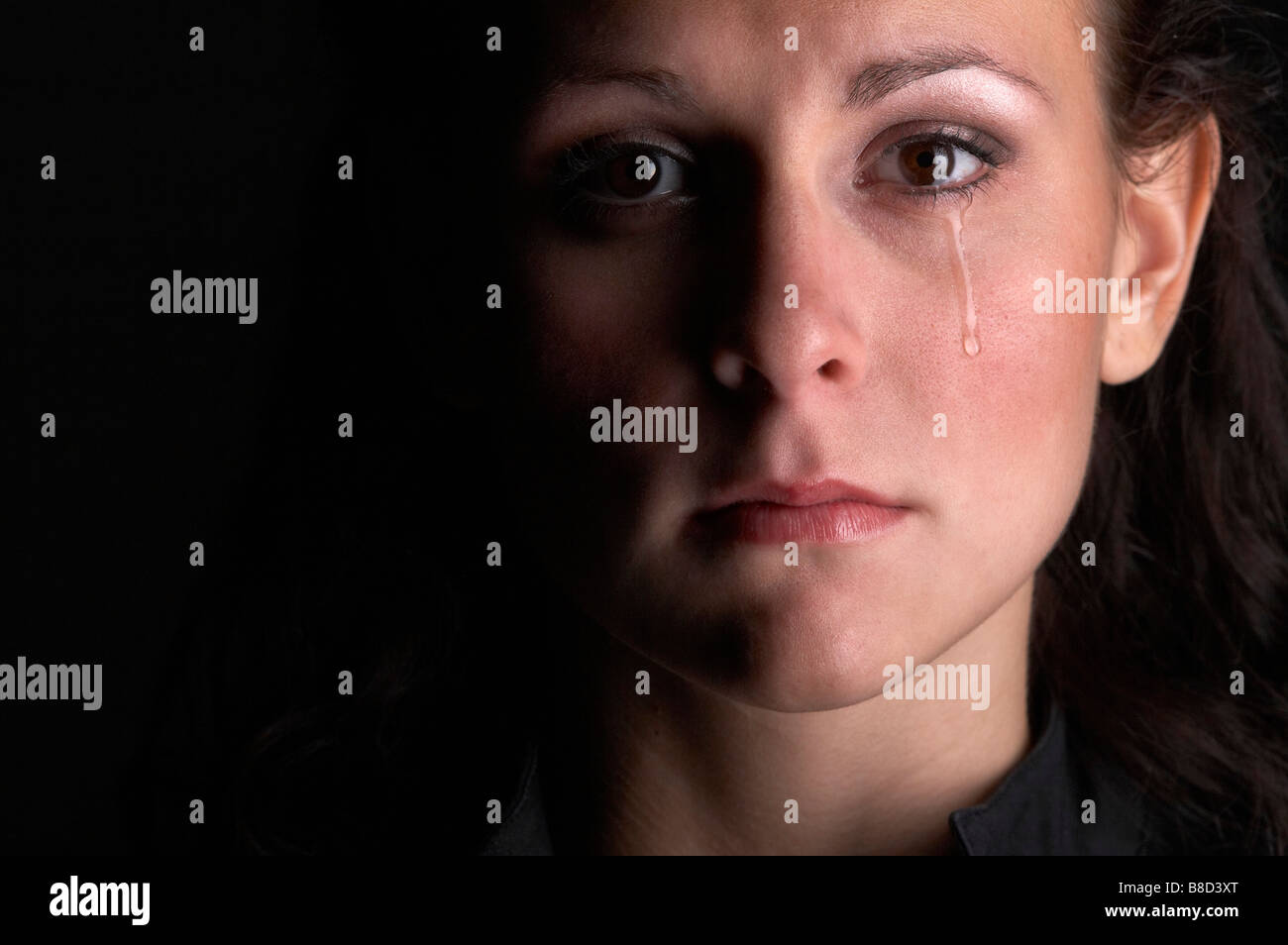 Woman Tear Cheek Stock Photo - Alamy