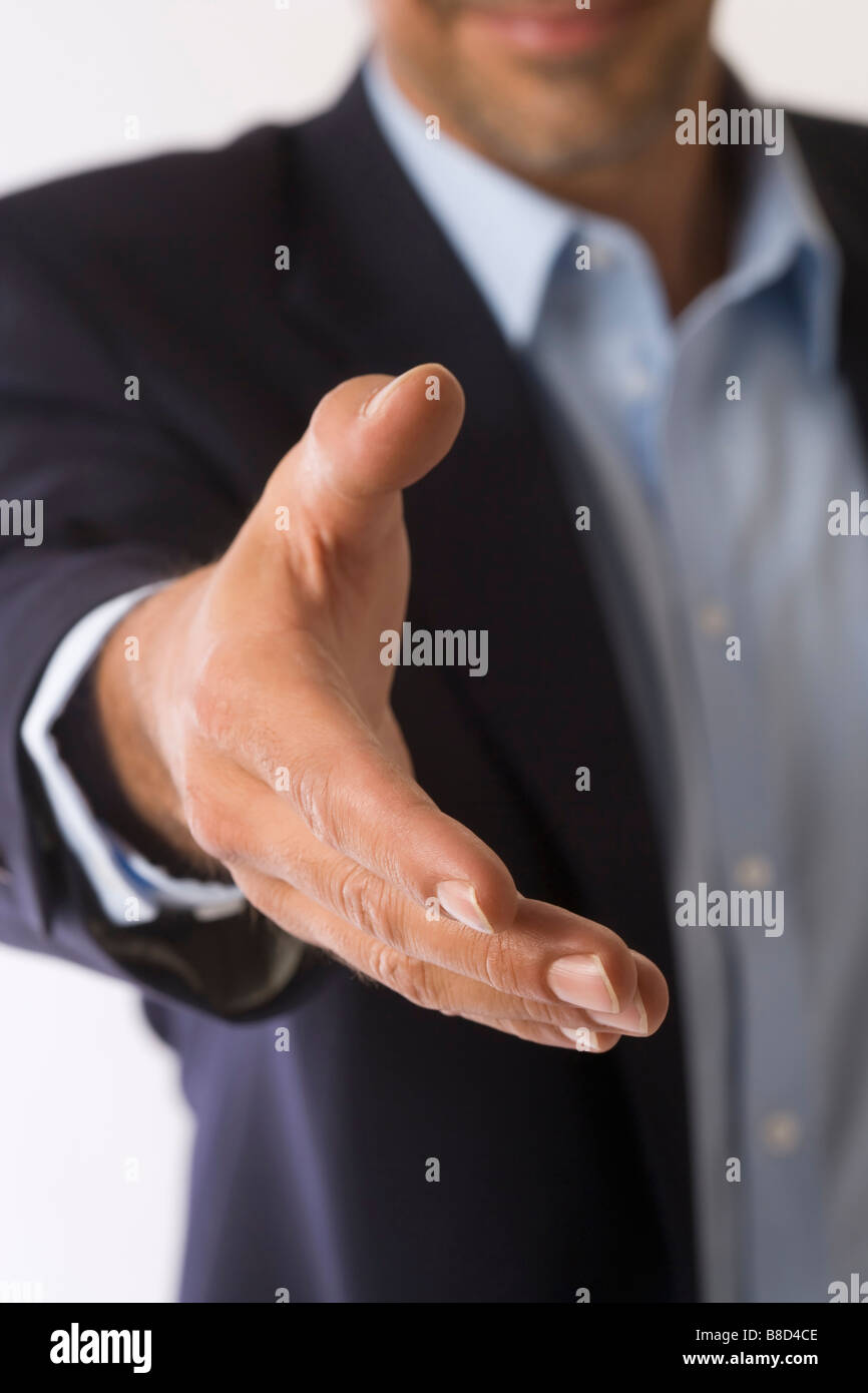 Extending hand of friendship hi-res stock photography and images - Alamy
