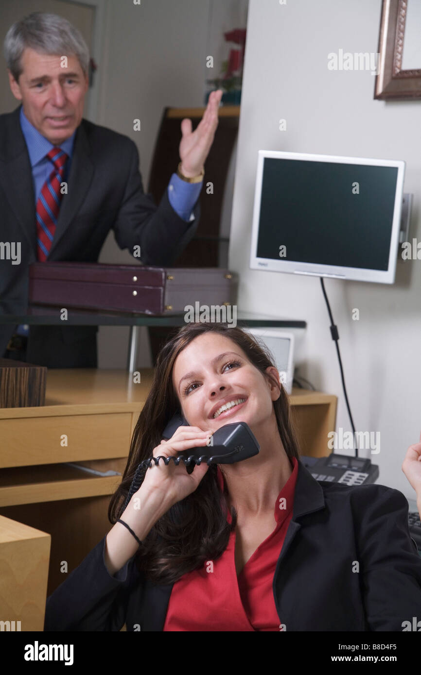 Receptionist Talking Phone Stock Photo - Alamy