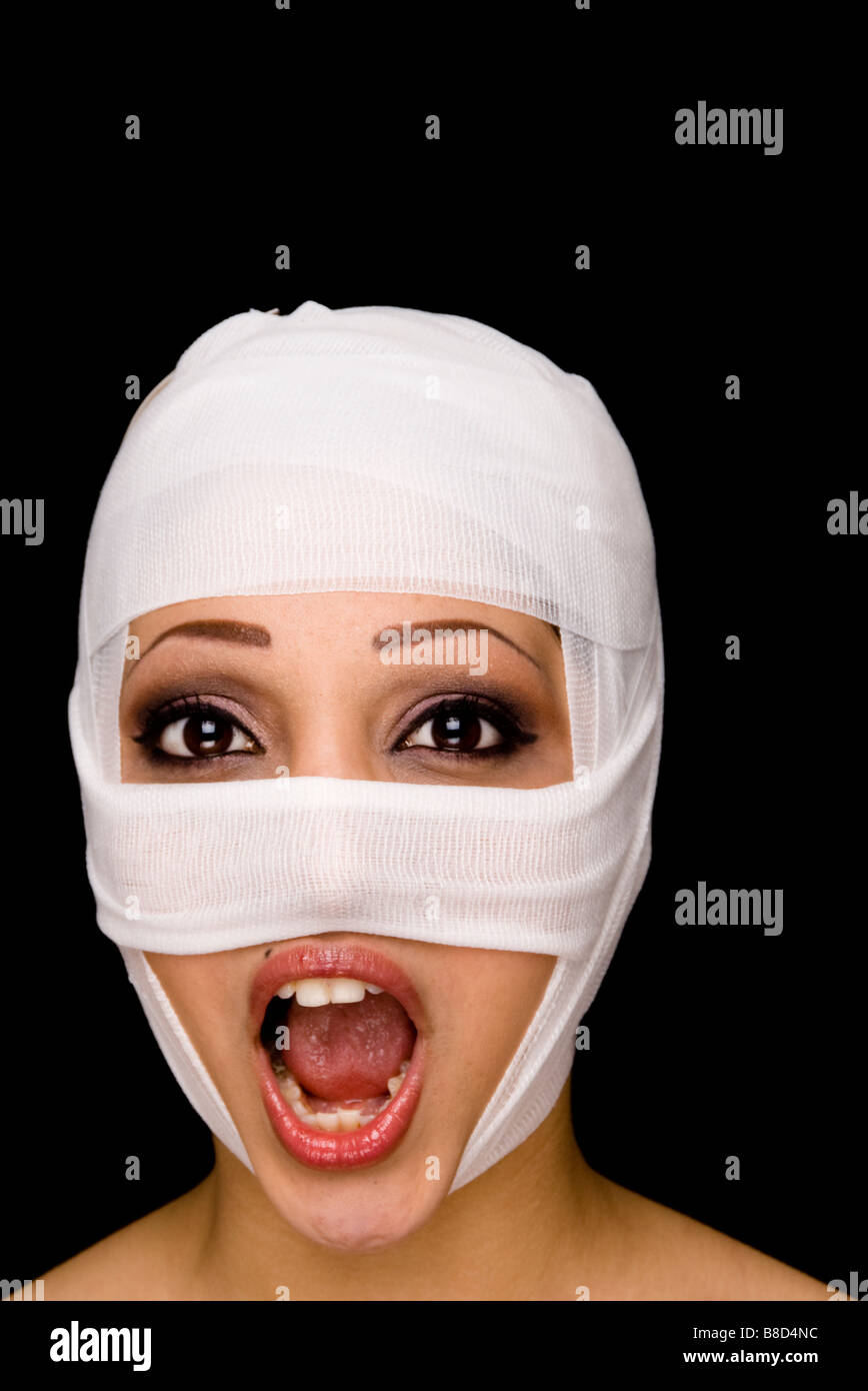 Bandaged eyes woman hi-res stock photography and images - Alamy