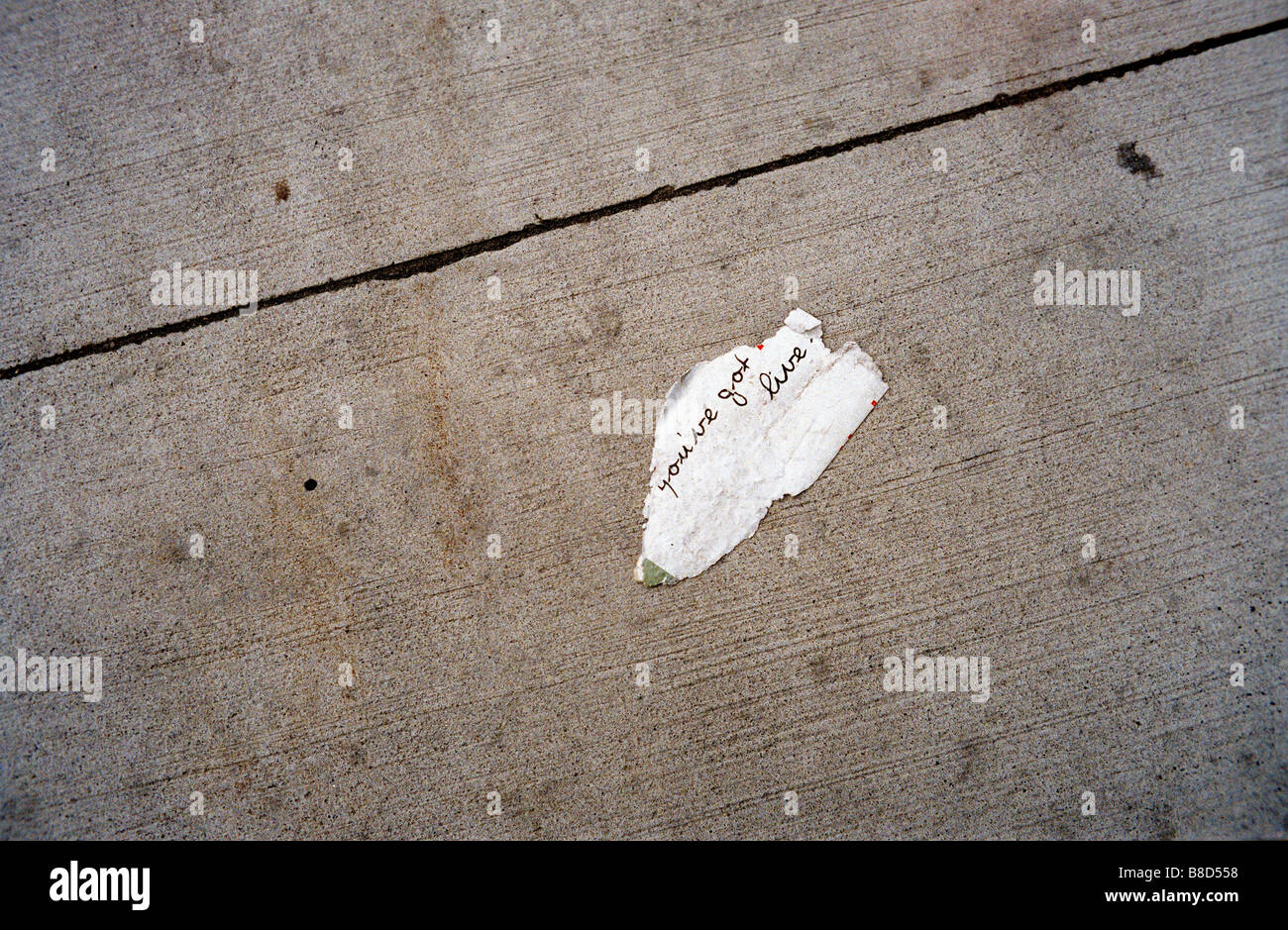 Torn Note Sidewalk Stock Photo - Alamy