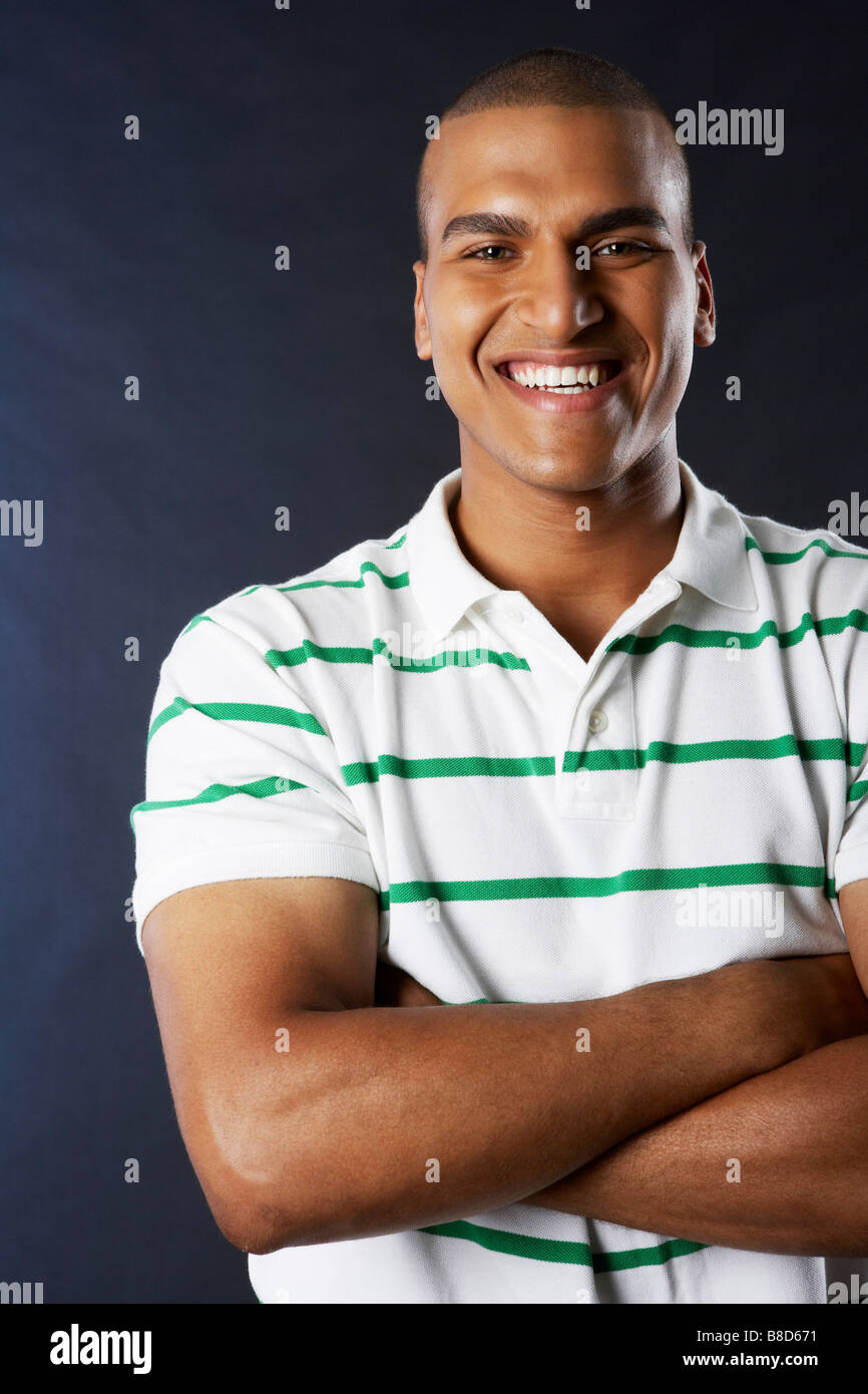 Man Smiling Arms Crossed Studio Stock Photo - Alamy