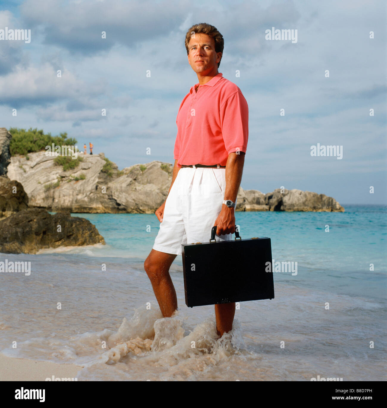 Man Standing Briefcase Water, Bermuda Stock Photo - Alamy