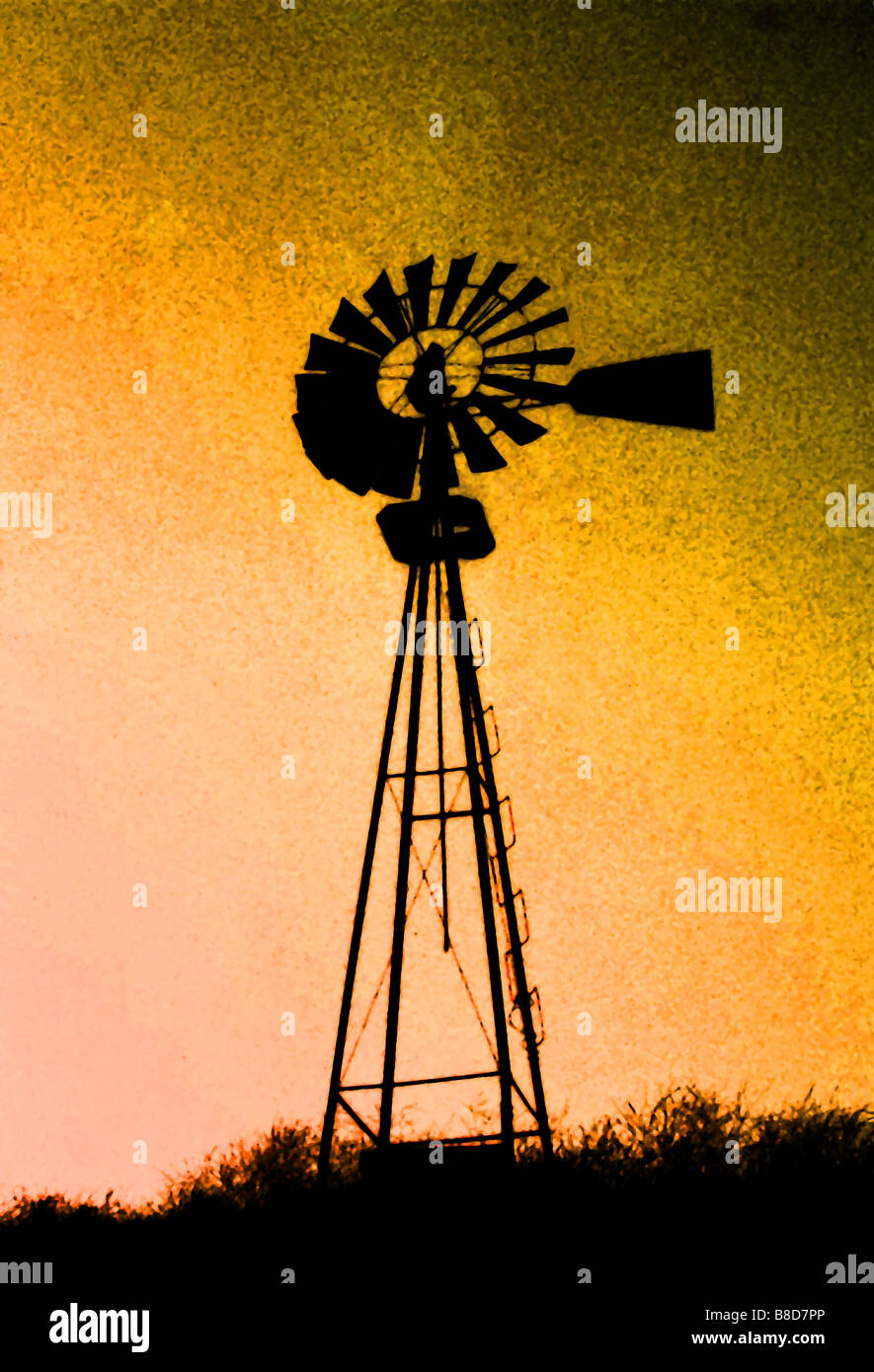 A windmill at sunset Stock Photo - Alamy