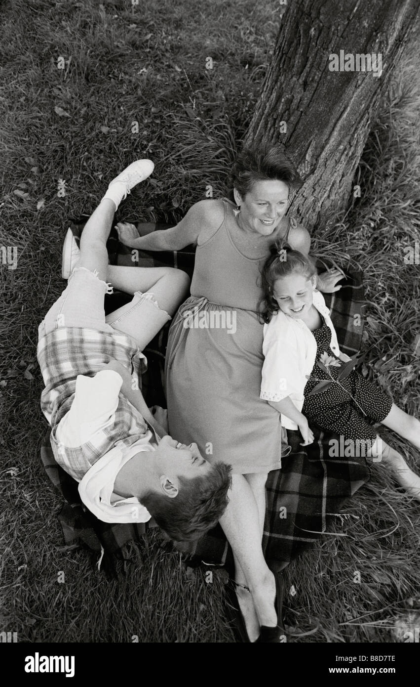 Family sitting under hi-res stock photography and images - Alamy