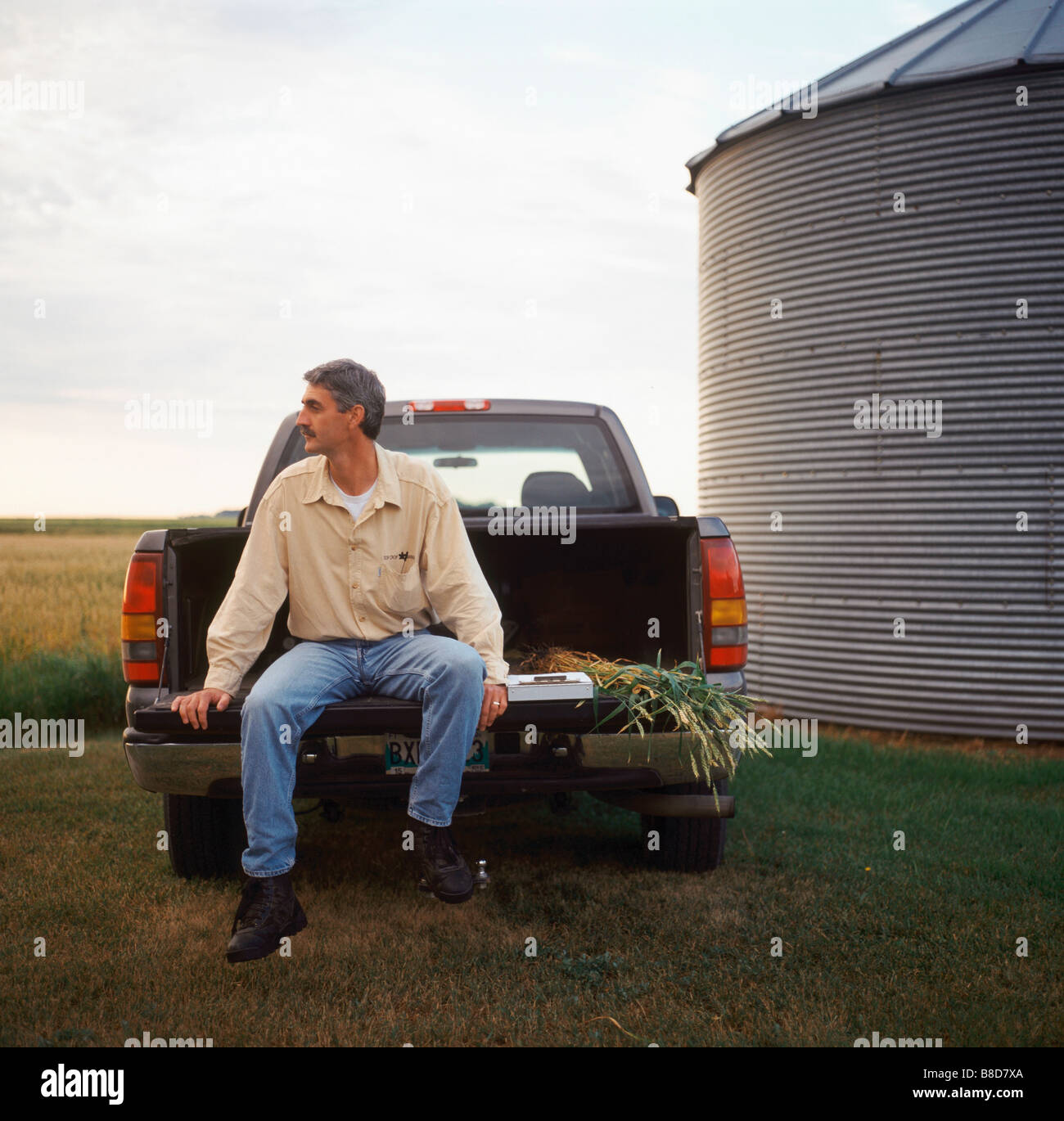 Man Sitting Truck, Carman, Manitoba Stock Photo - Alamy