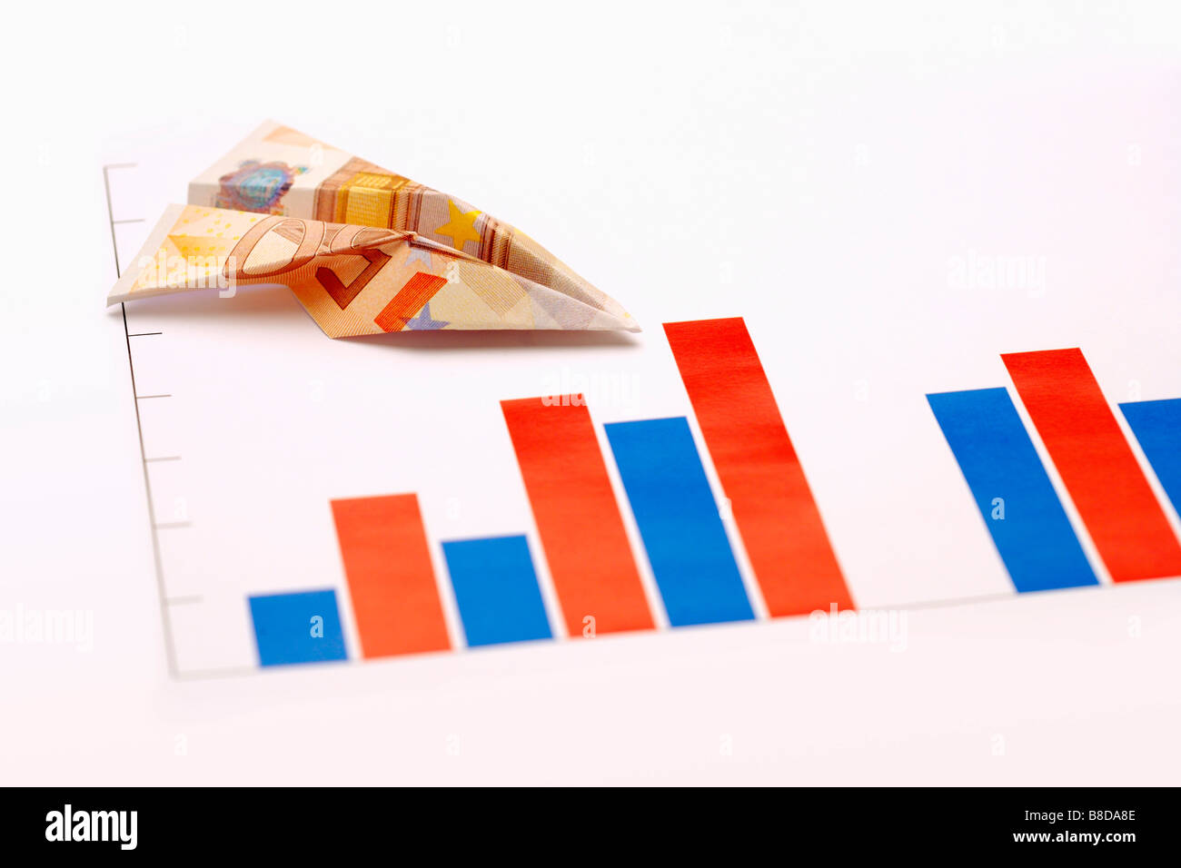 Bar graph and paper plane Stock Photo - Alamy