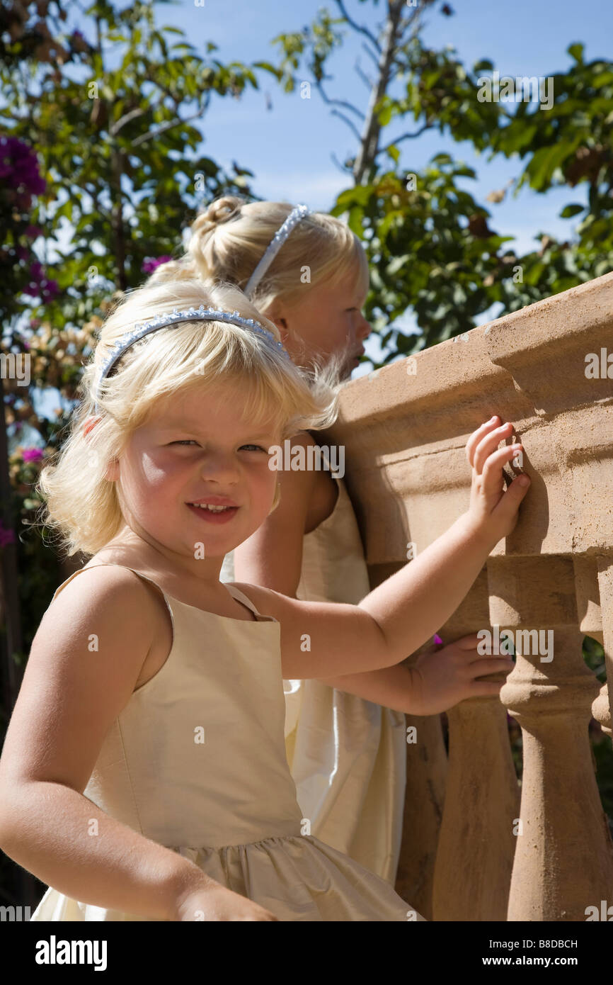 Two girls on balcony Stock Photo - Alamy