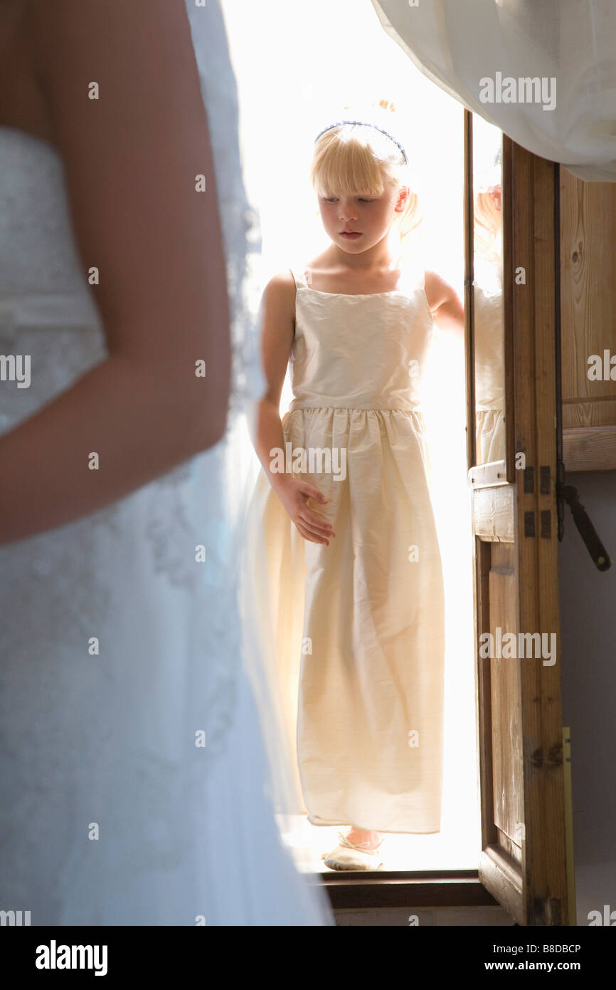 Girl entering house during wedding reception Stock Photo - Alamy