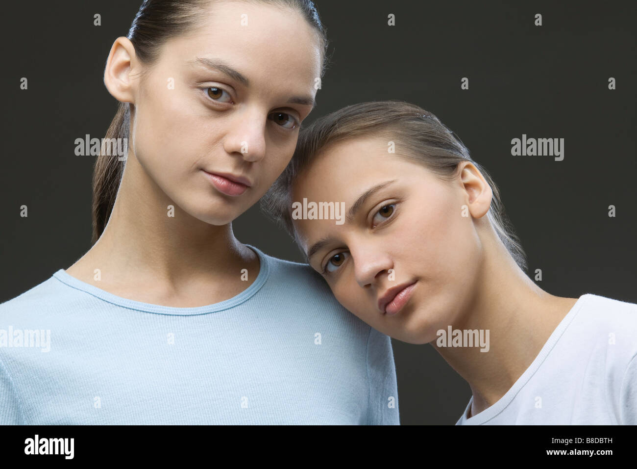 Studio portrait of two sisters Stock Photo - Alamy