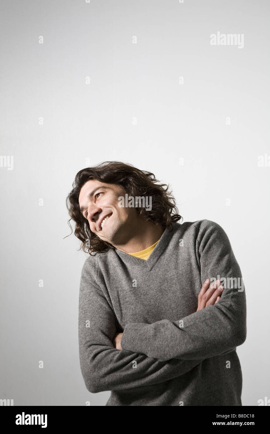 Mid-adult man smiling, studio shot Stock Photo - Alamy