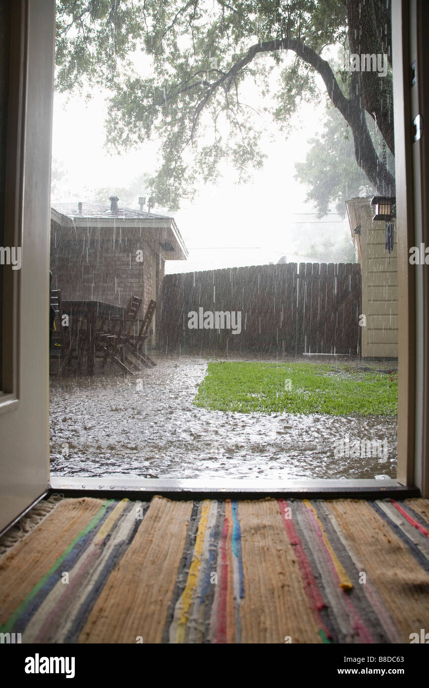 Heavy rain in backyard Stock Photo - Alamy