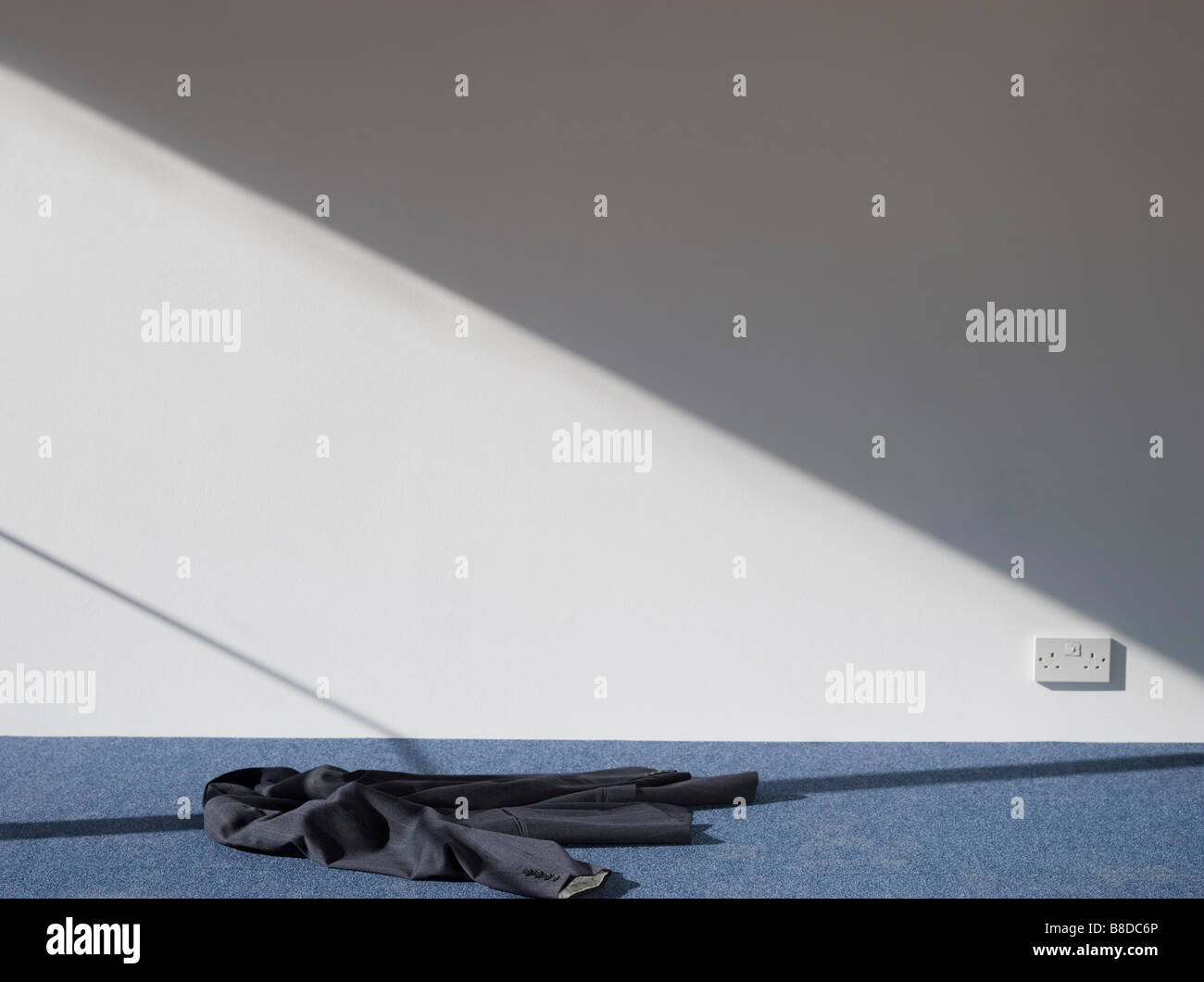 Jacket on floor Stock Photo - Alamy