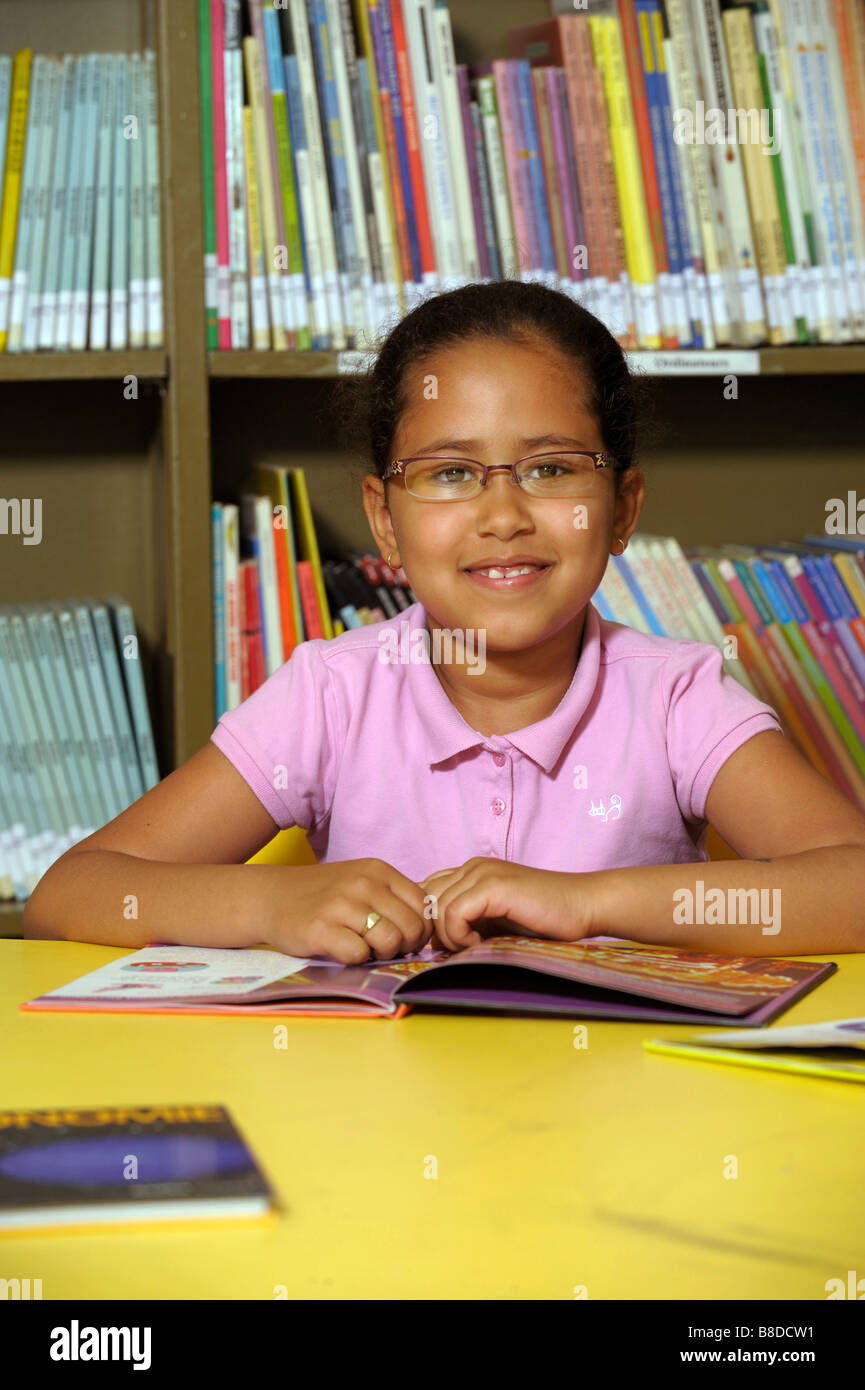 Portrait Little Girl School Library Stock Photo - Alamy