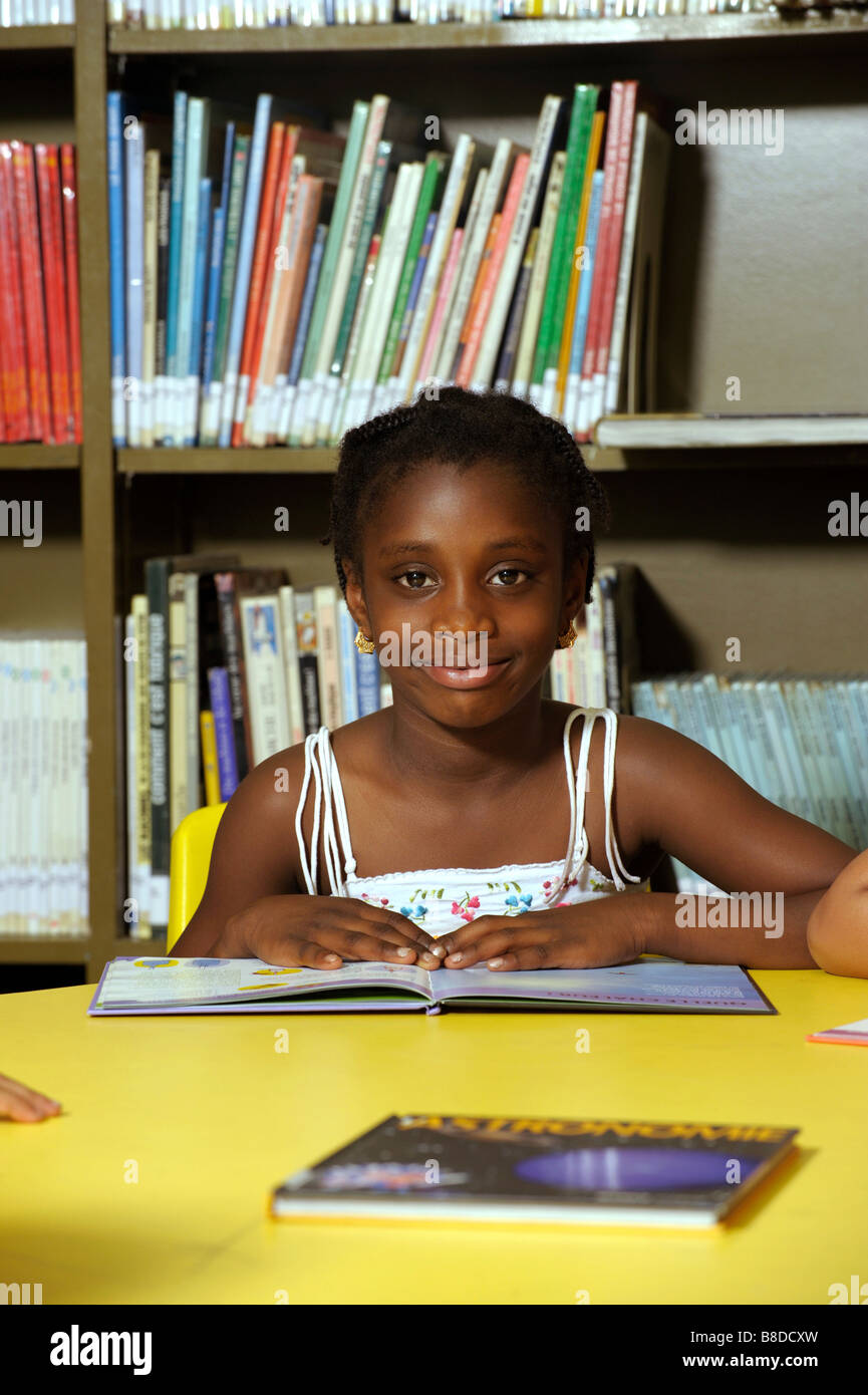 Portrait Little Girl School Library Stock Photo - Alamy