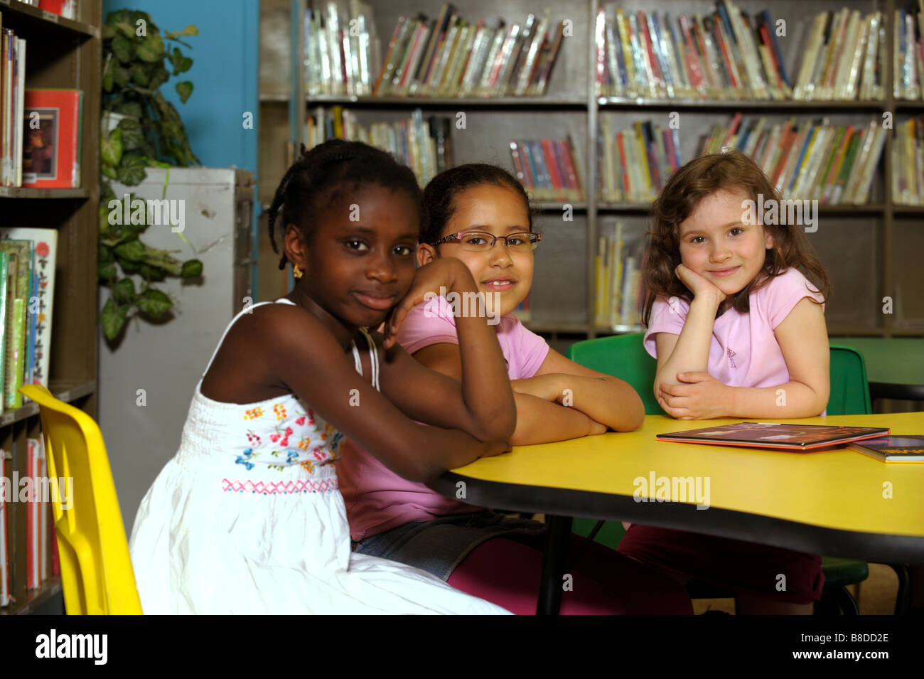 Little Girls School Library Stock Photo - Alamy