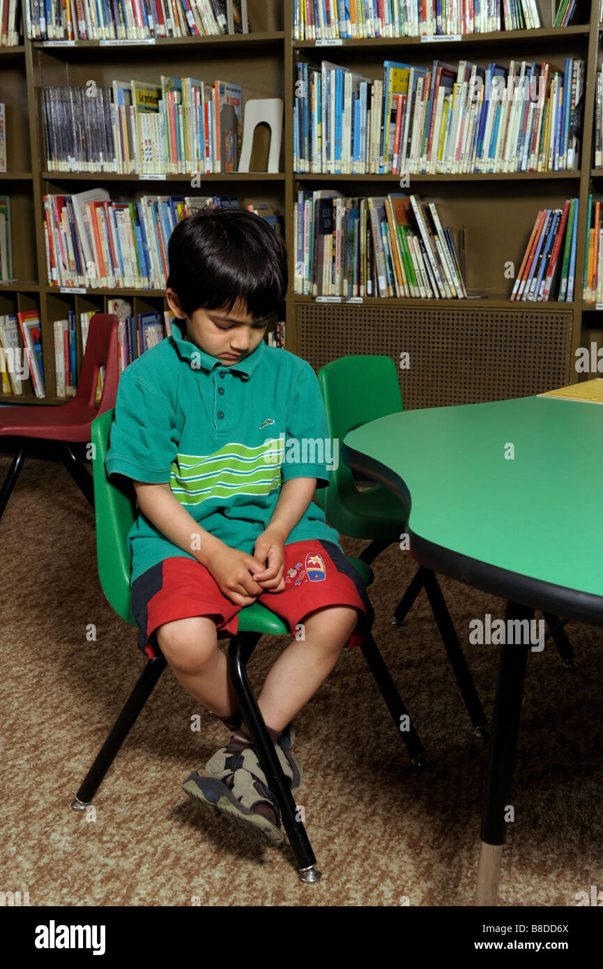 Student Sitting Alone Stock Photo - Alamy