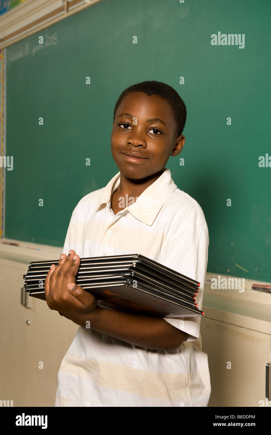 Student Holding Books Blackboard Stock Photo - Alamy