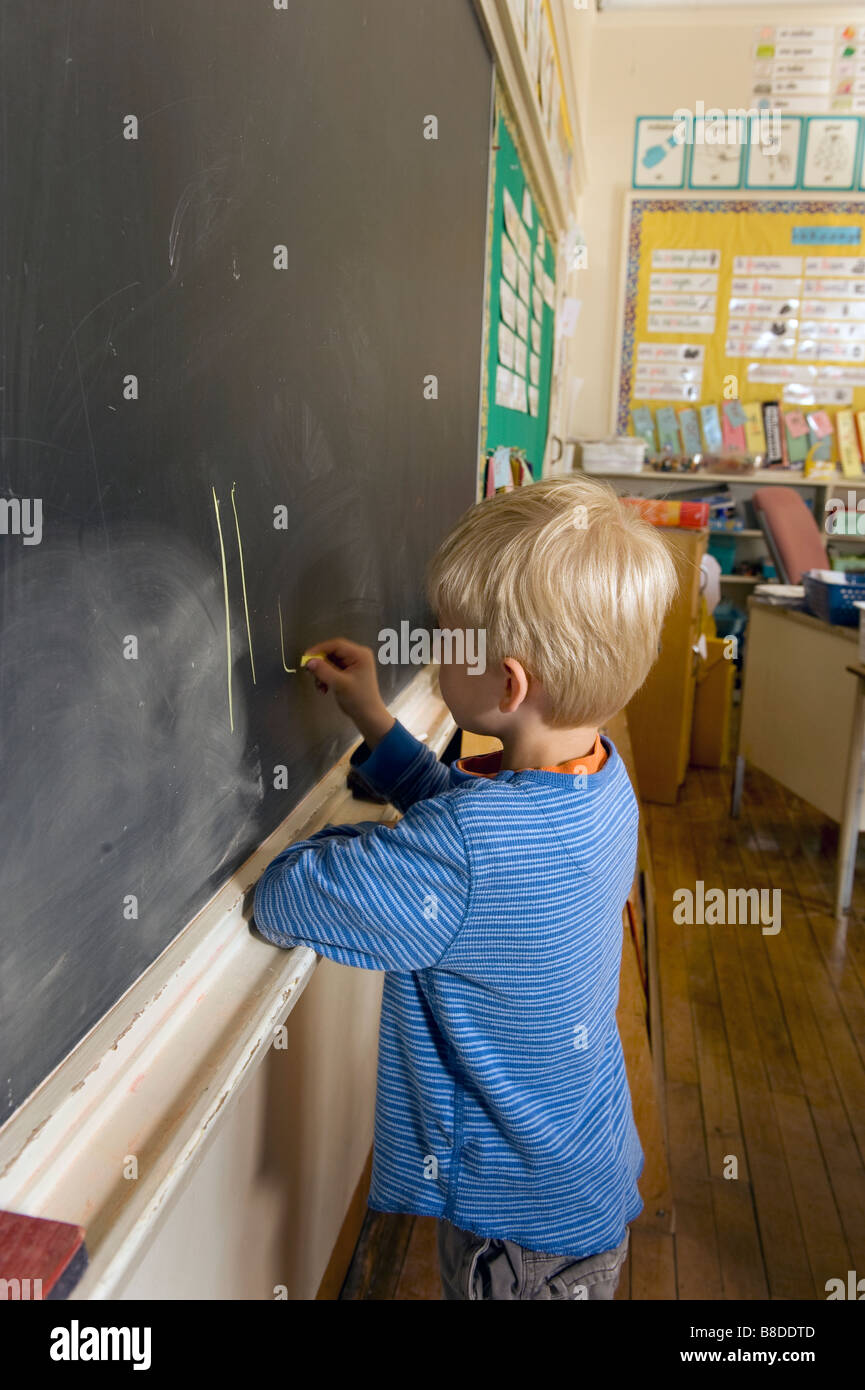 Student Writing Blackboard Stock Photo - Alamy