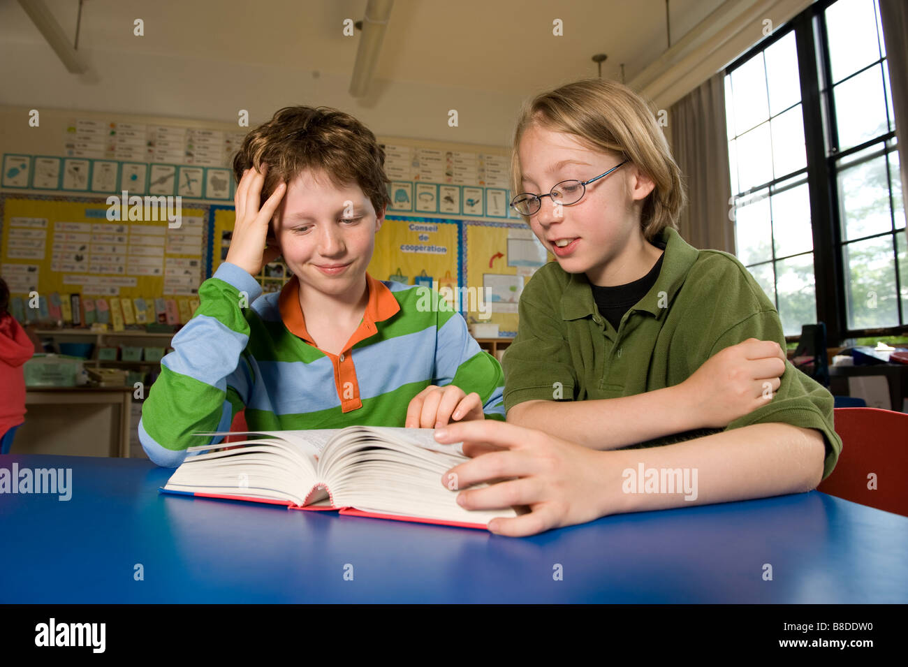 Students Reading Book School Library Stock Photo - Alamy