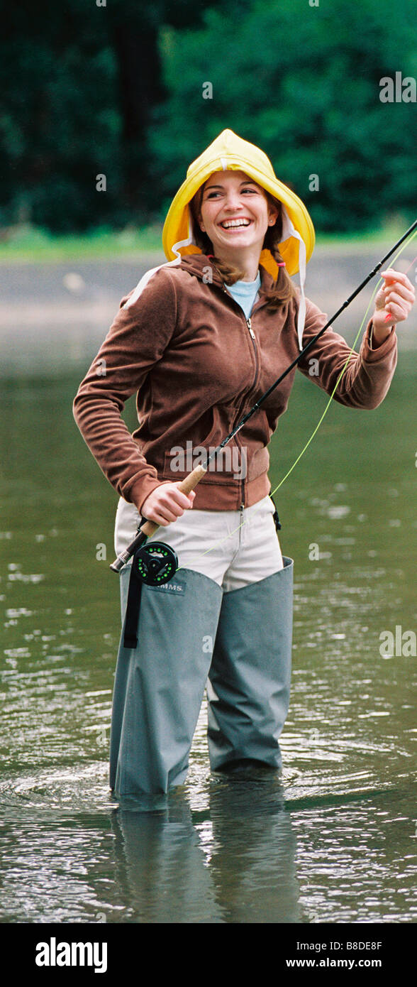 Woman Standing Water, Fishing Stock Photo - Alamy