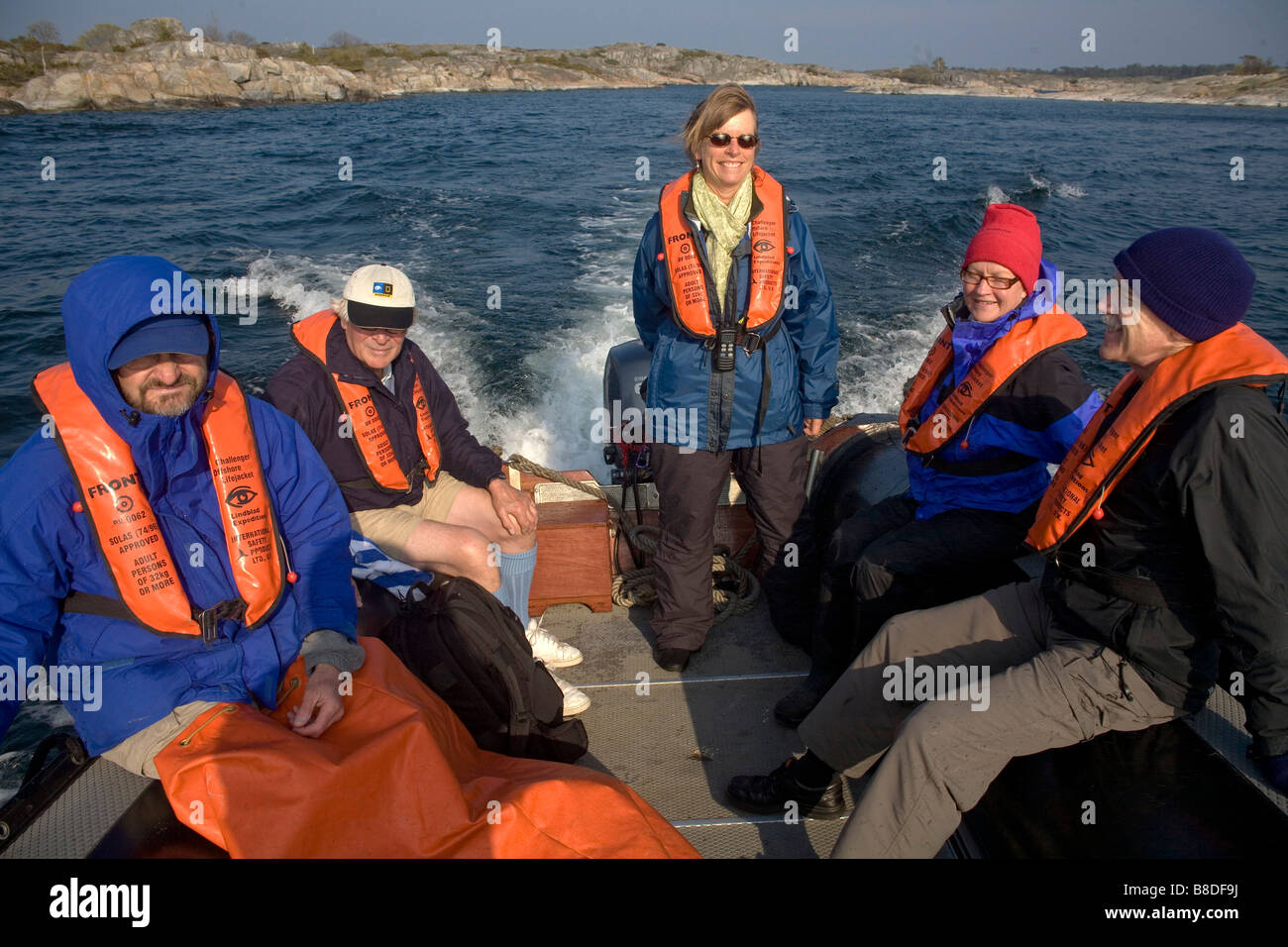 American tourists arriving in zodiac to Bullero island at Swedish ...