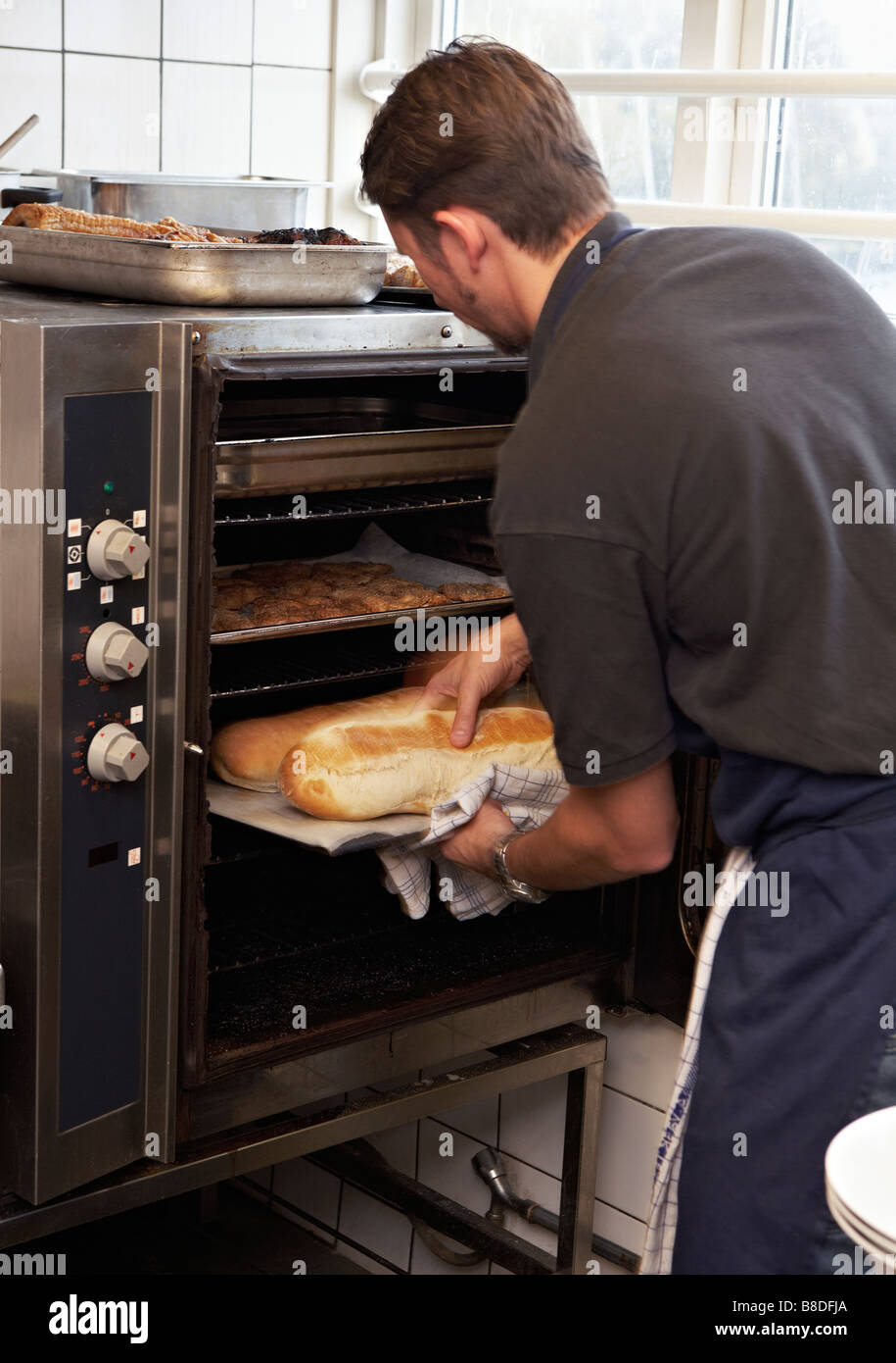 Baking action hi-res stock photography and images - Alamy