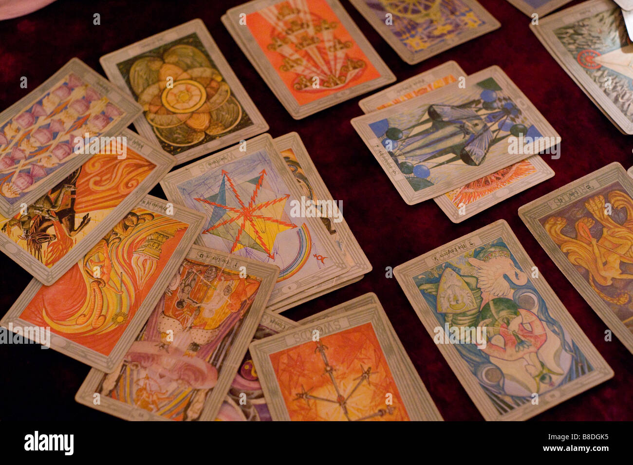 Reading tarot cards on a table Stock Photo - Alamy