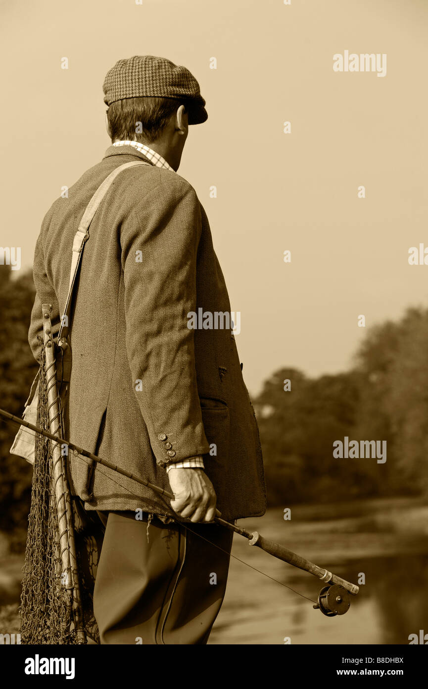 Wales; Wrexham. A trout fisherman surveys the lie of the River Dee (MR ...