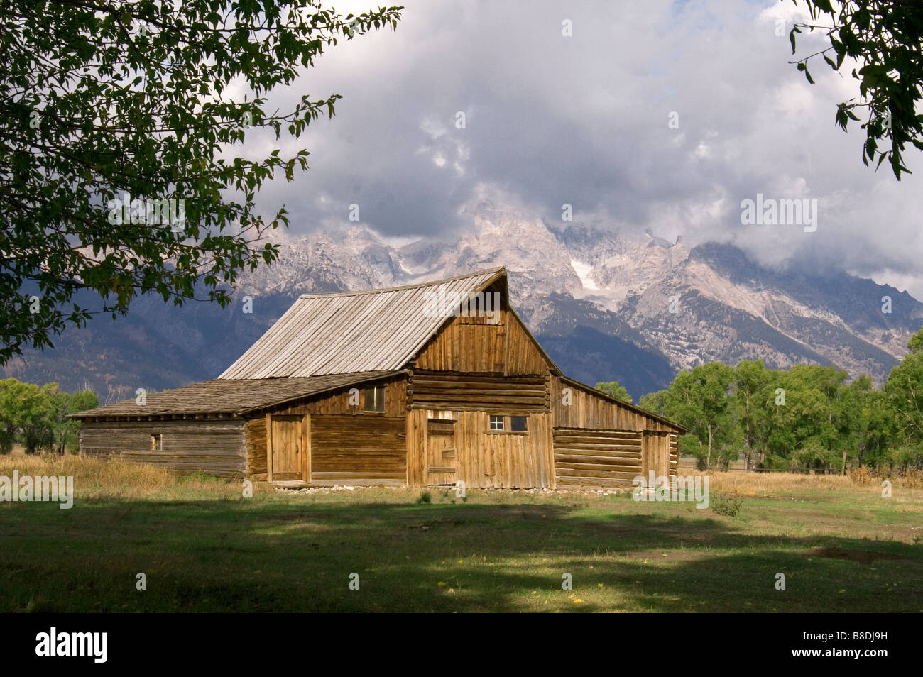The Grand Tetons Mountain Range with Homestead Ranch and Barn Stock ...