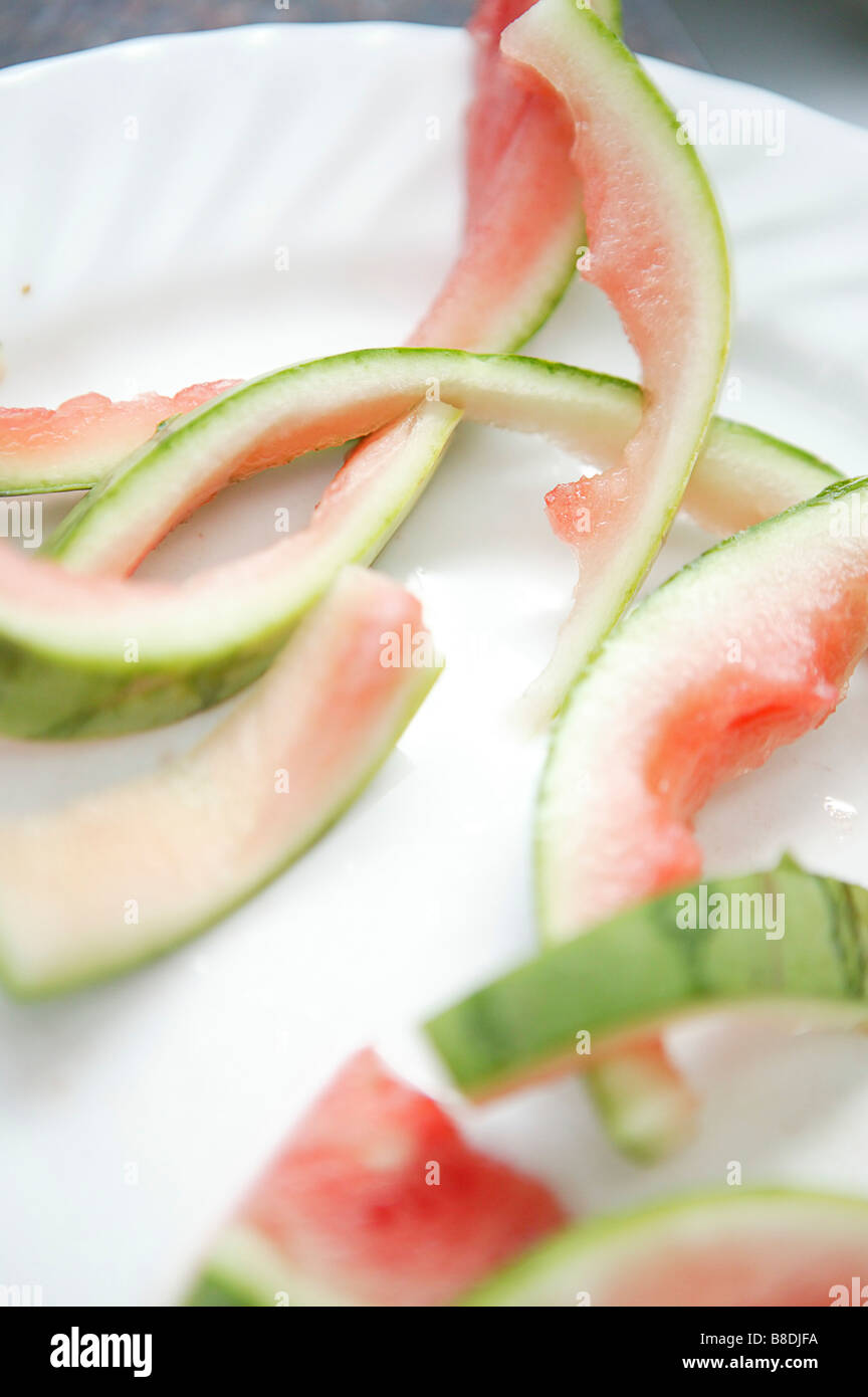 Watermelon rinds on paper plate Stock Photo - Alamy