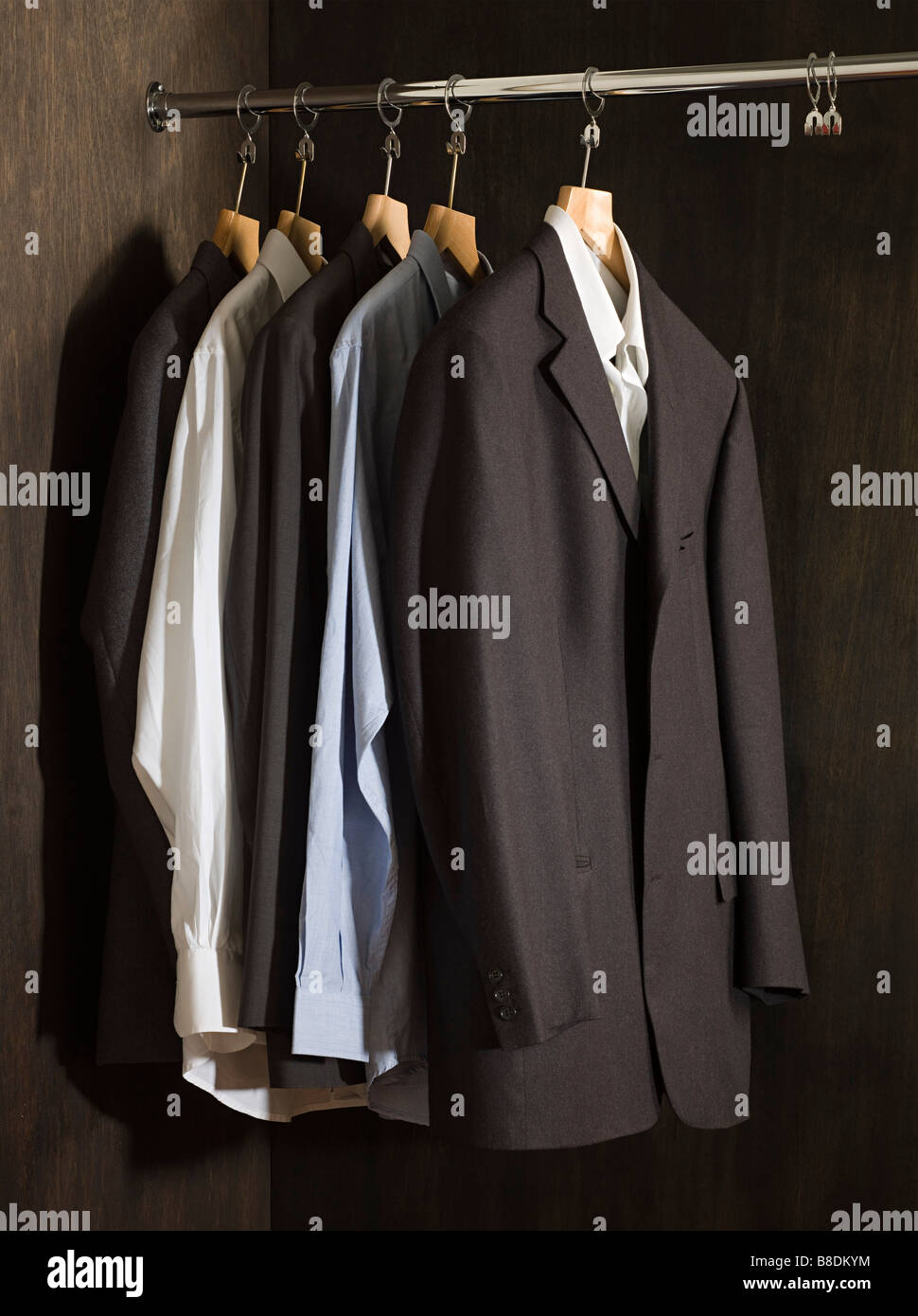 Row of clothes in a closet hi-res stock photography and images - Alamy