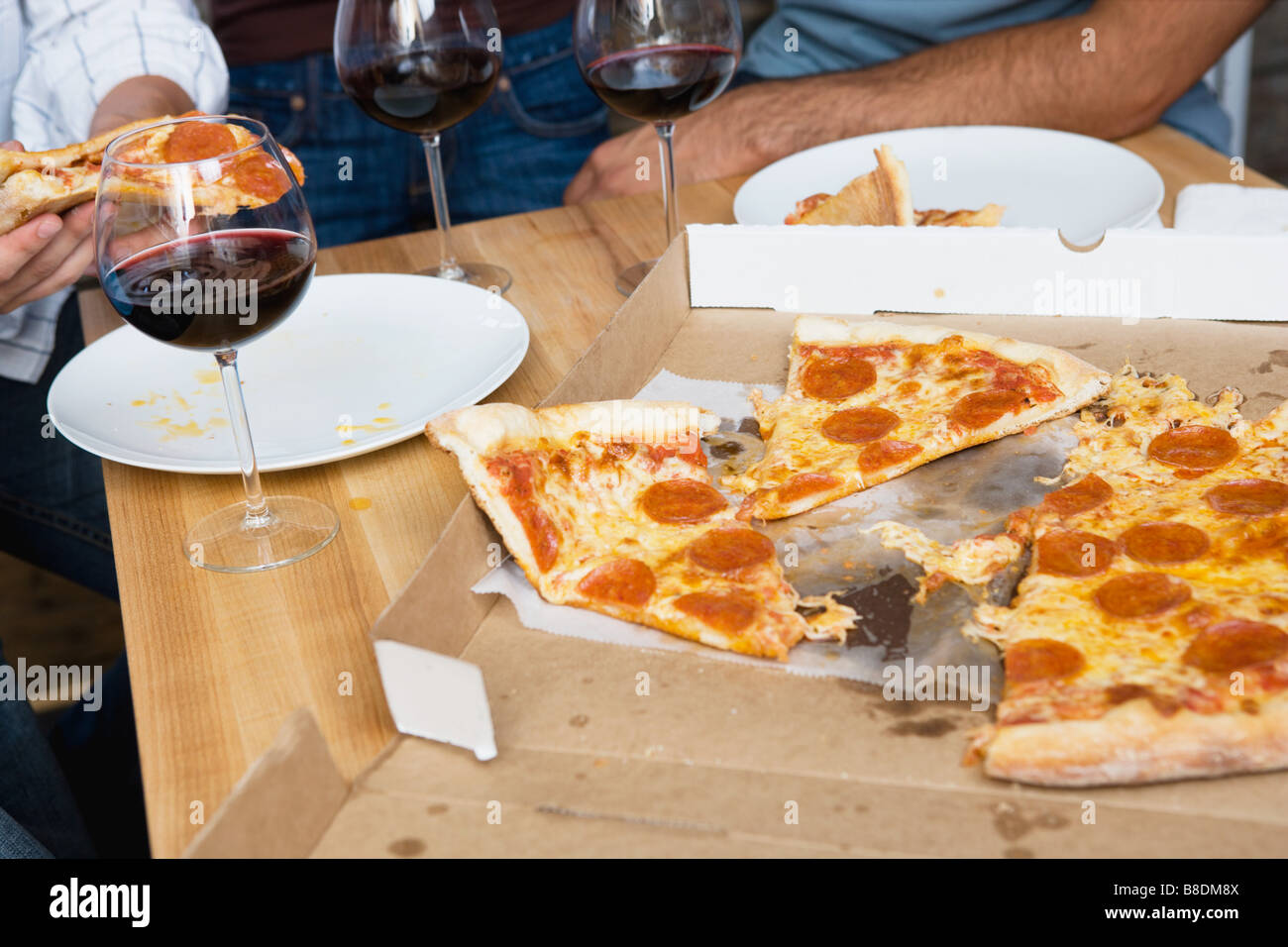 Pizza on a table Stock Photo - Alamy