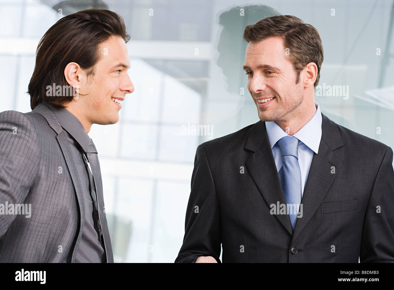 Businessmen in office Stock Photo - Alamy