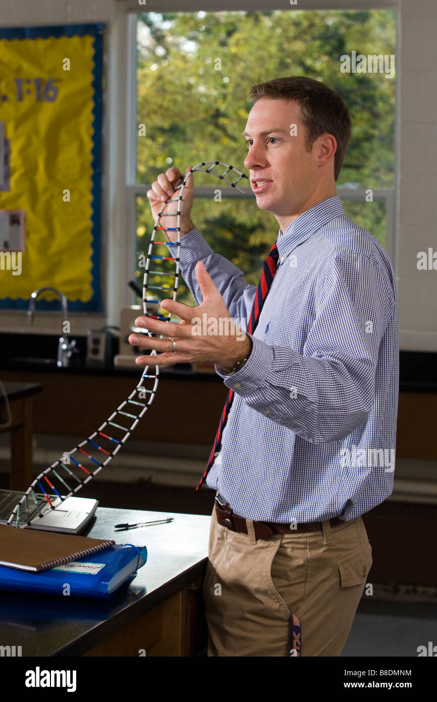 High school teacher in science classroom Stock Photo - Alamy