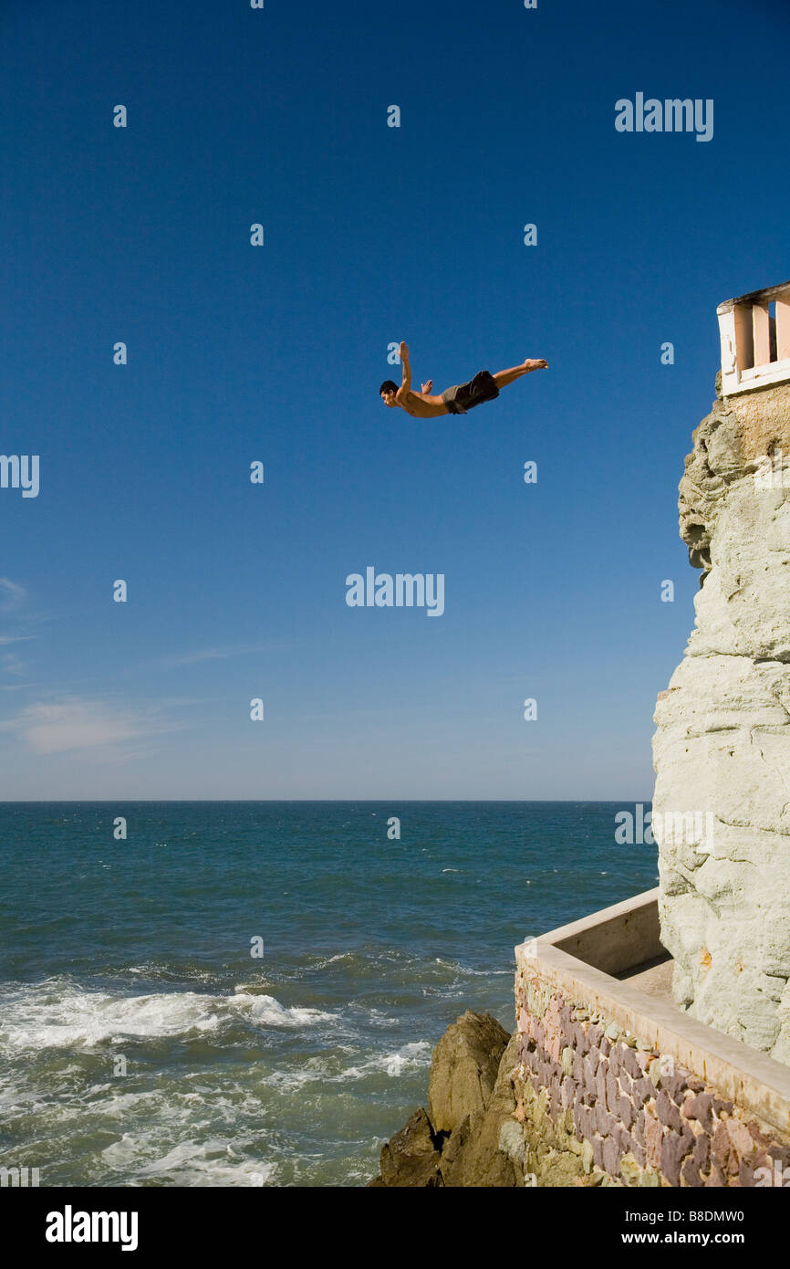 Person Diving Off Cliff