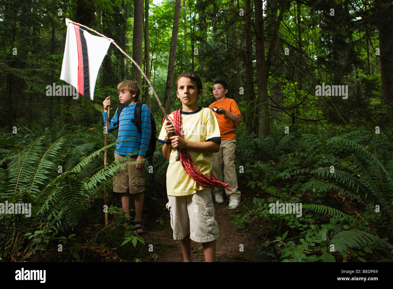 Boys in forest Stock Photo - Alamy