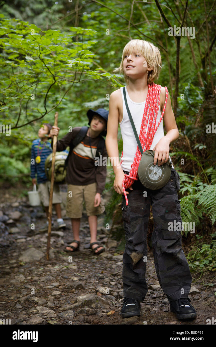 Boys in forest Stock Photo - Alamy