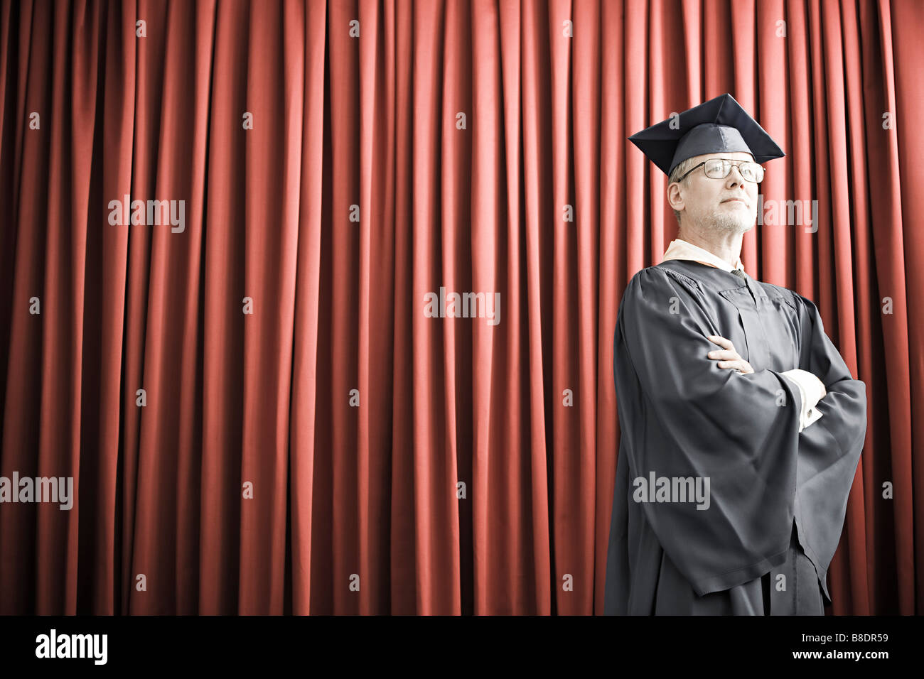 College dean in graduation gown hi-res stock photography and images - Alamy