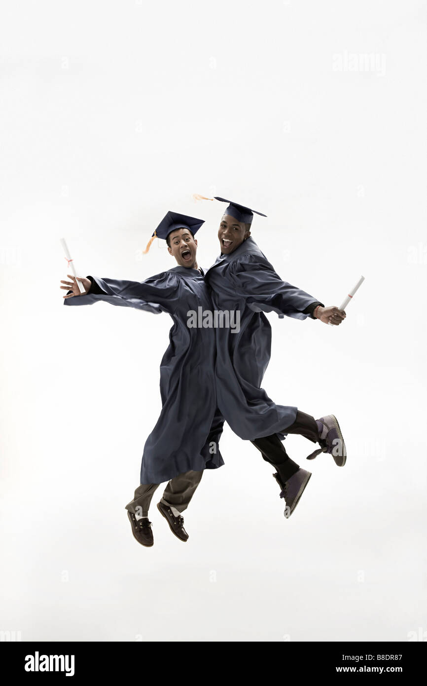 Graduate jumping joy hi-res stock photography and images - Alamy