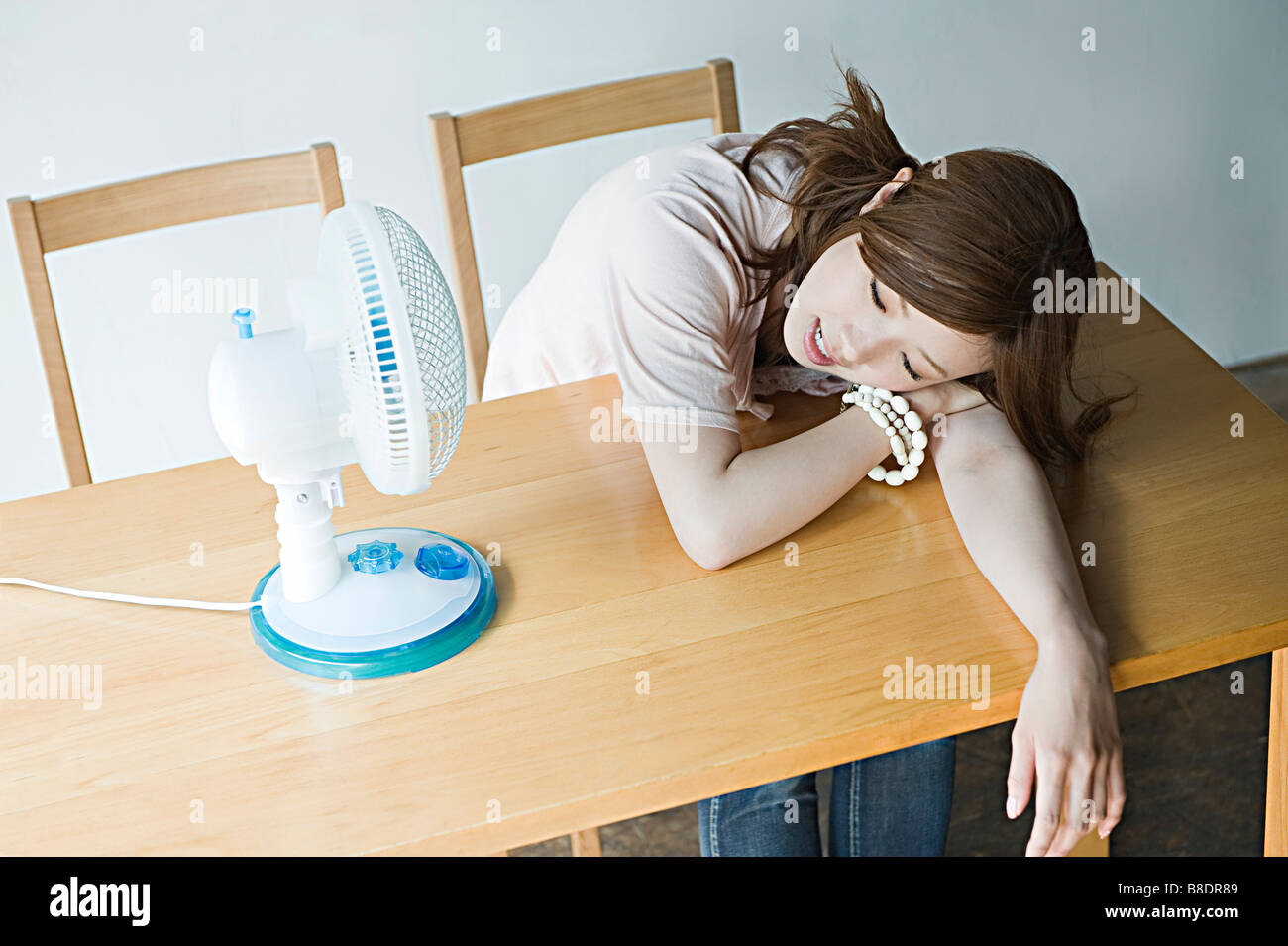 Woman hot weather fan hi-res stock photography and images - Alamy