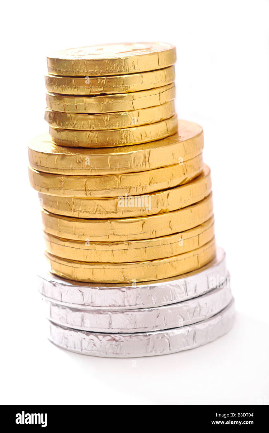 Stack of EURO chocolate coins on white High Key Stock Photo - Alamy