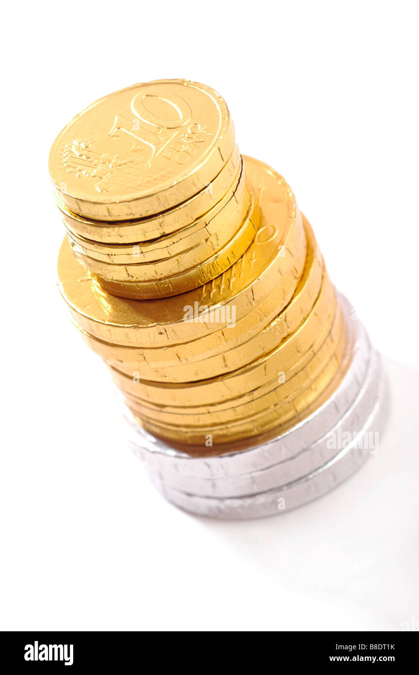 Stack of EURO chocolate coins on white High Key Stock Photo - Alamy