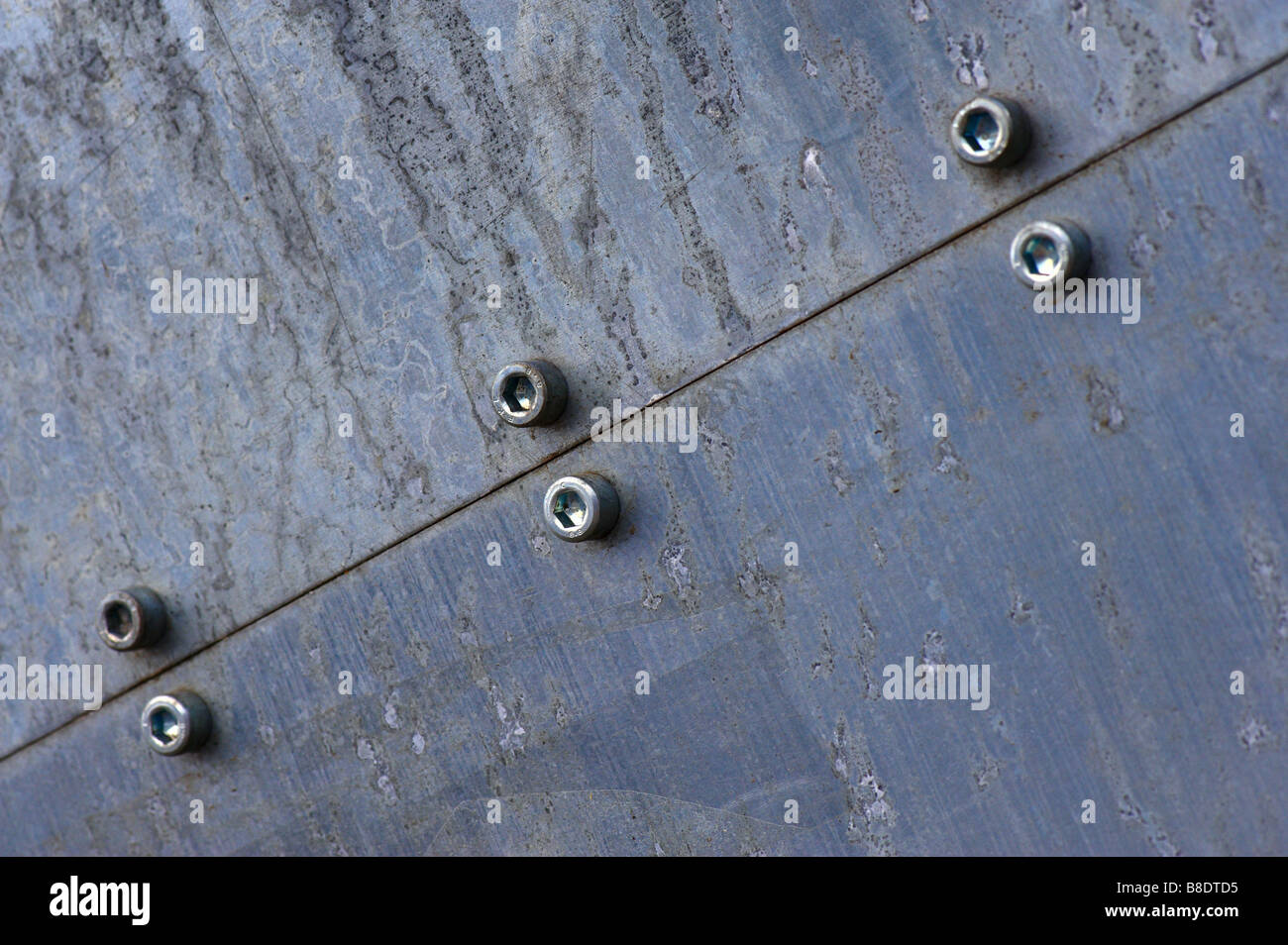 Metal structure with the shaped pattern. A close up Stock Photo - Alamy