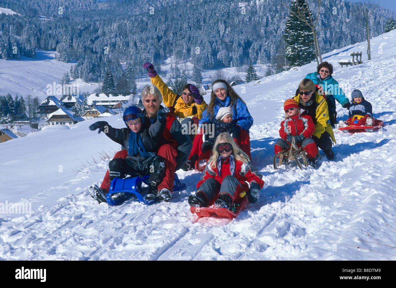 Sledge riding in the Black Forest Stock Photo - Alamy